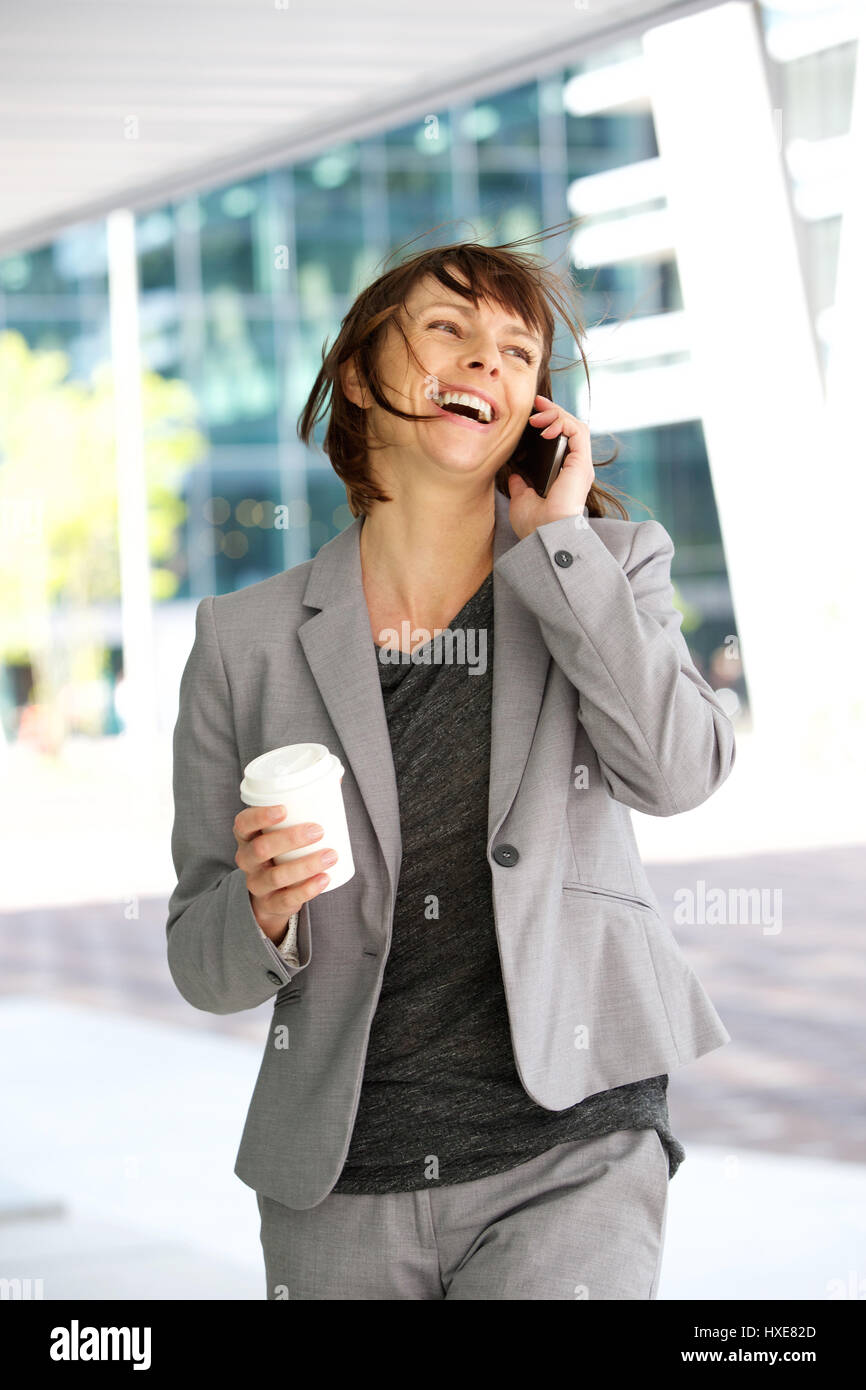 Attractive mature female walking talking hi-res stock photography and ...