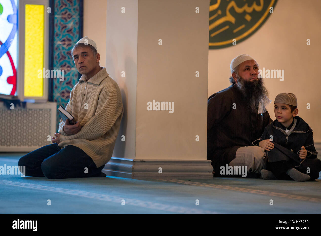 Muslim people pray at the hall of the Moscow Cathedral Mosque, Russia ...
