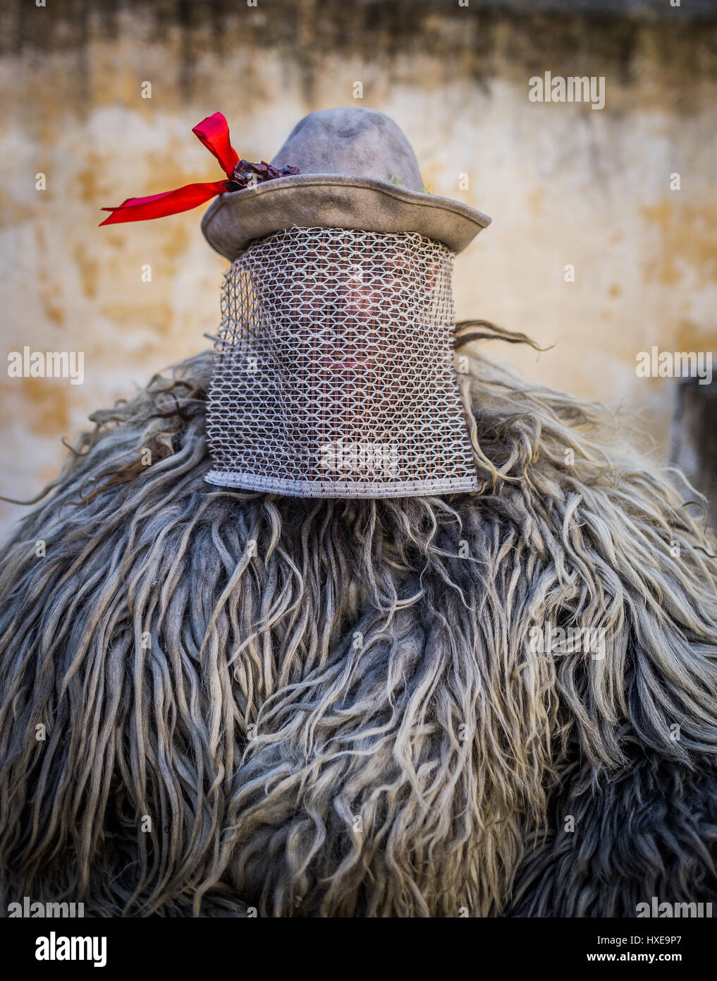 Young man dressed as a "buso" in a mask during the annual Buso ...
