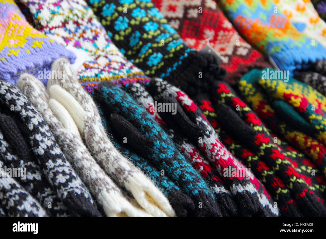 Bunch of handmade colorful woolen socks at showcase Stock Photo - Alamy