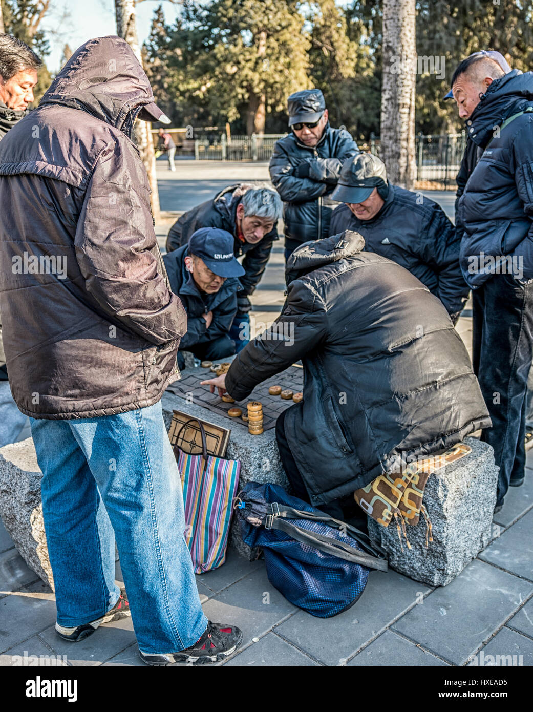 Elderly Chinese men playing Chinese checkers in the Temple of Heaven ...