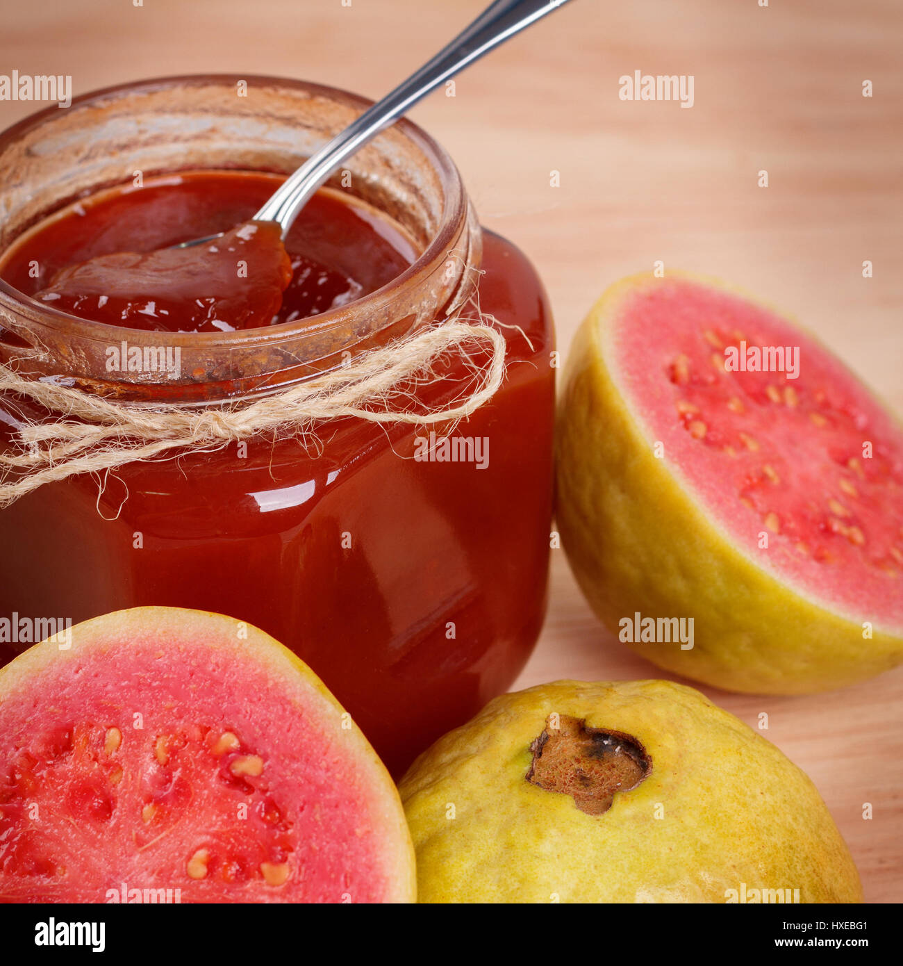 Brazilian dessert goiabada - jam of guava with fresh goiaba on wooden ...