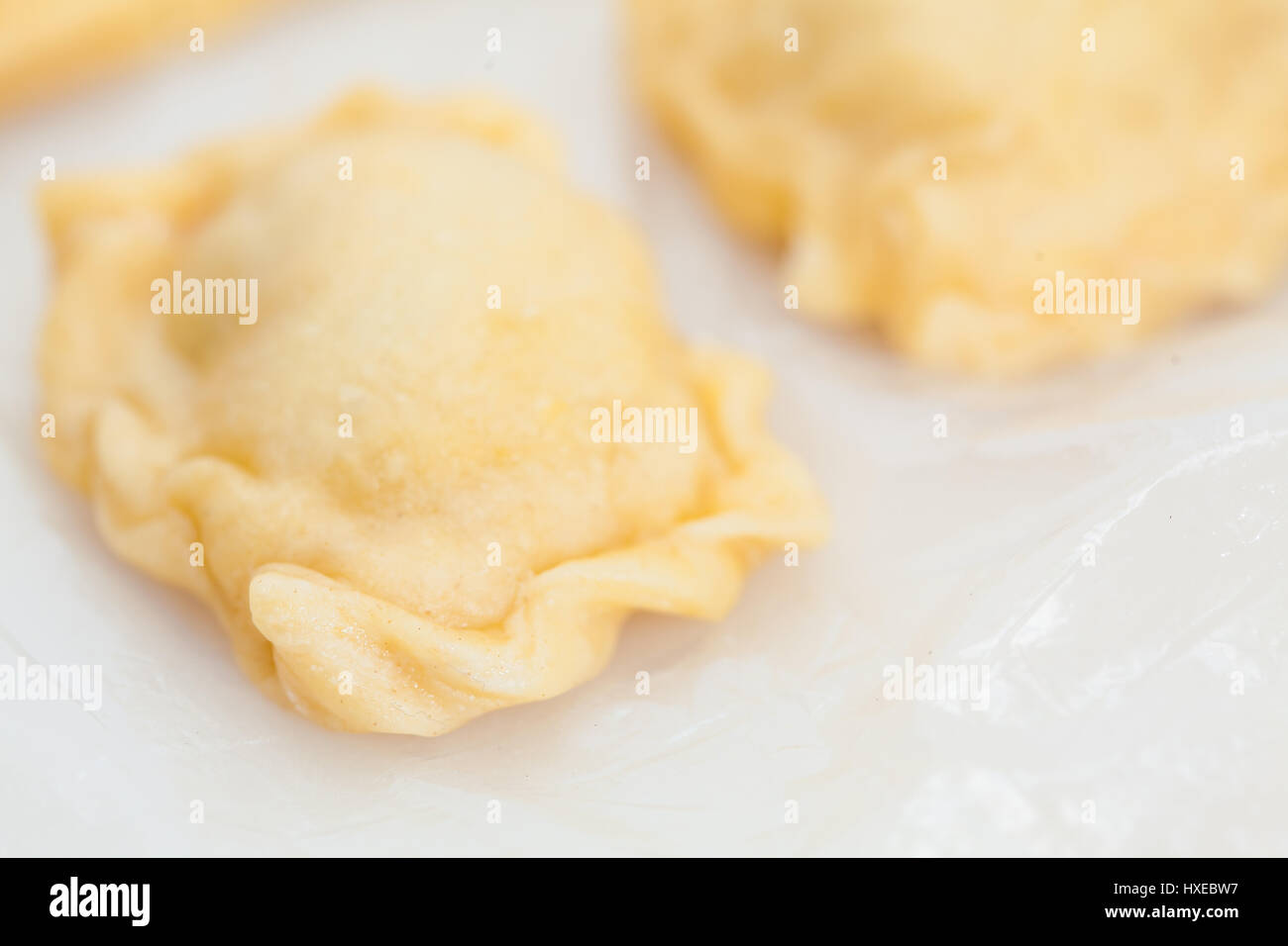Ravioli Preparation : Raw sealed and decorated homemade ravioli Stock ...
