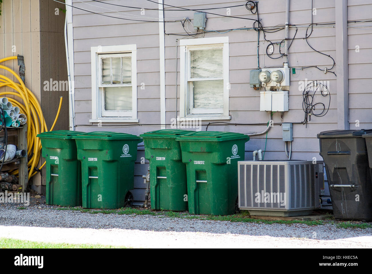 Recycle bins in the Houston Heights Stock Photo - Alamy