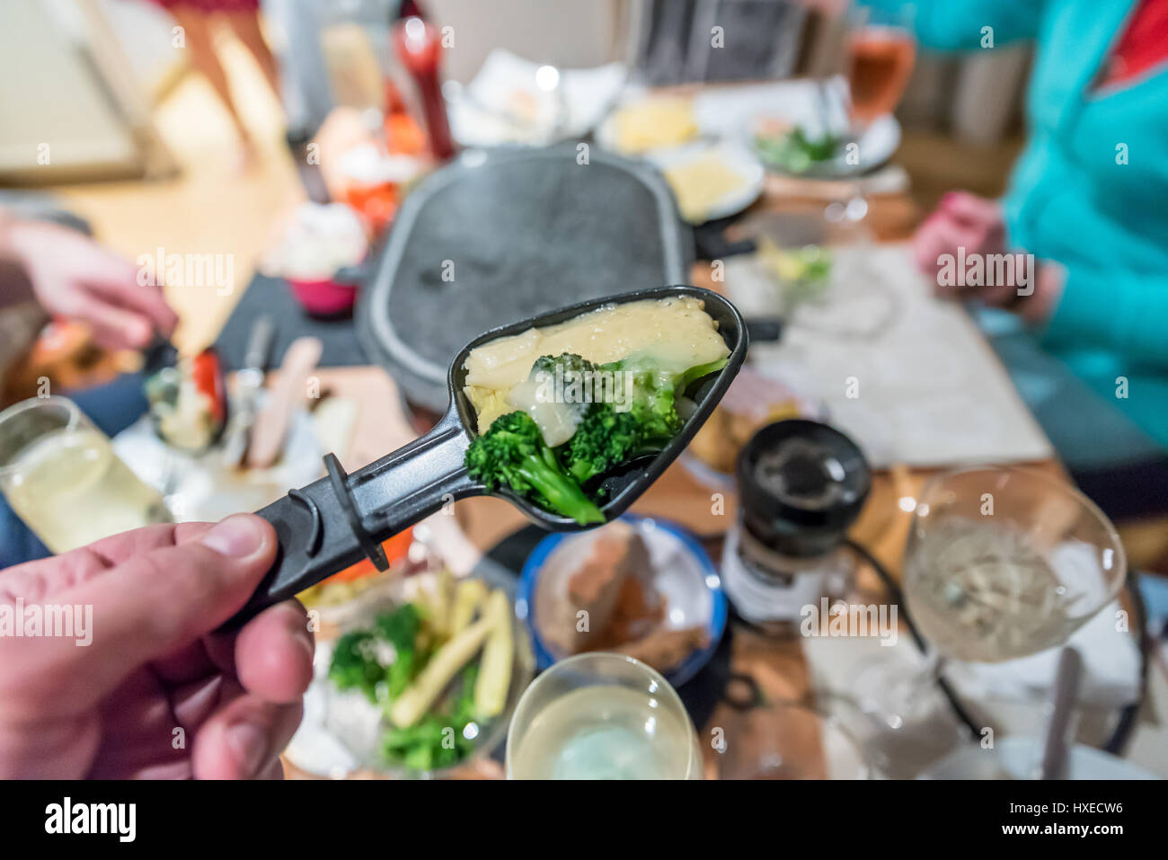 View of Family table for cooking on Raclette Stock Photo - Alamy