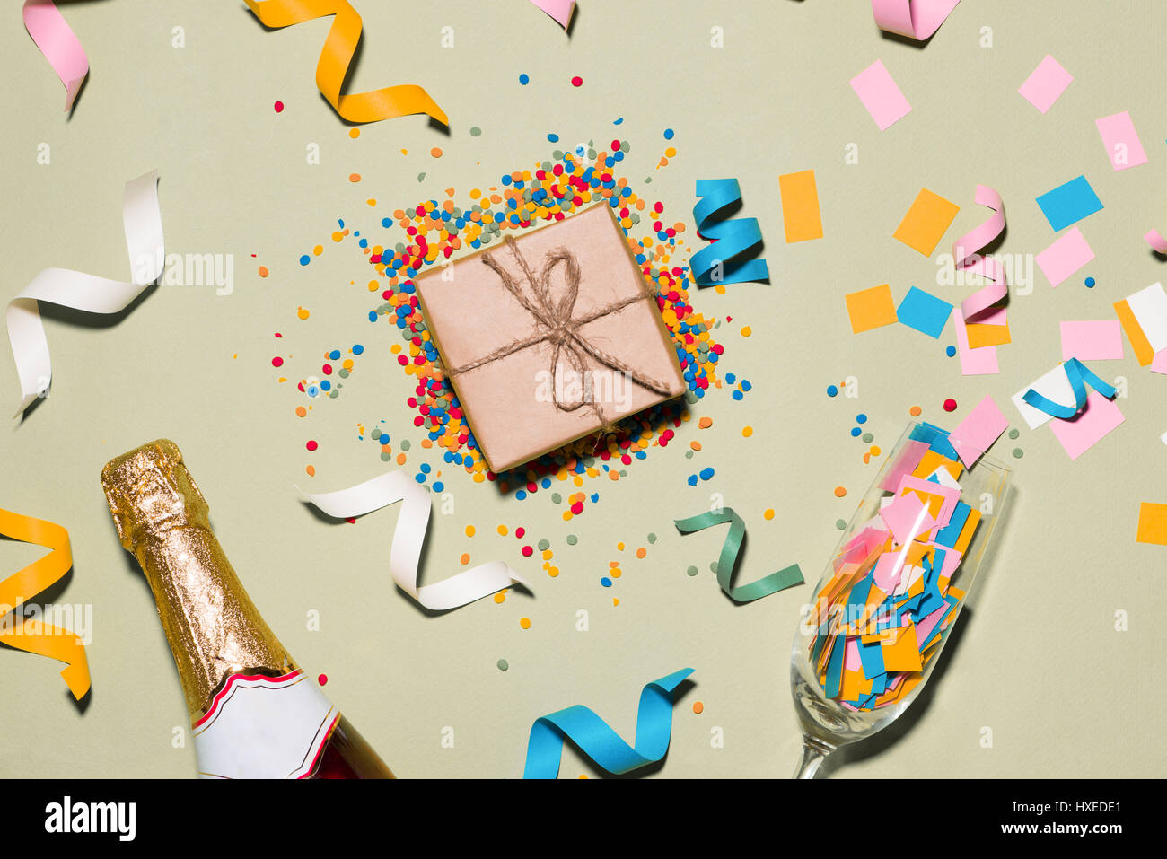Celebration Flat lay. Gift box with colorful party items on green ...