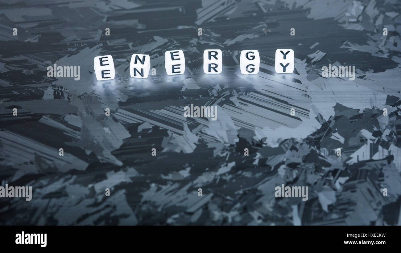 ENERGY cube letter on solar silicon cell surface. Concept of renewable ...