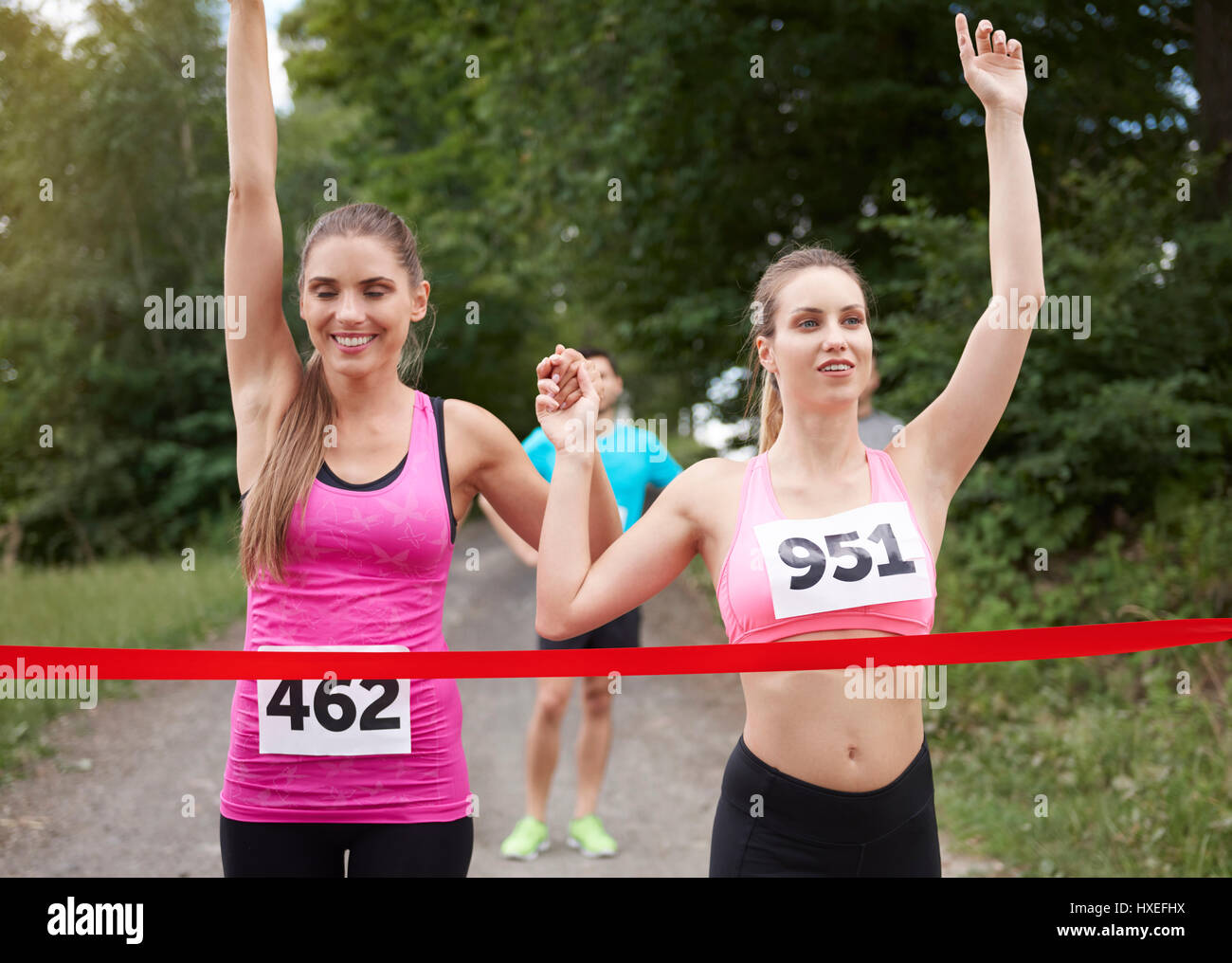 The winning team on the finishing line Stock Photo - Alamy