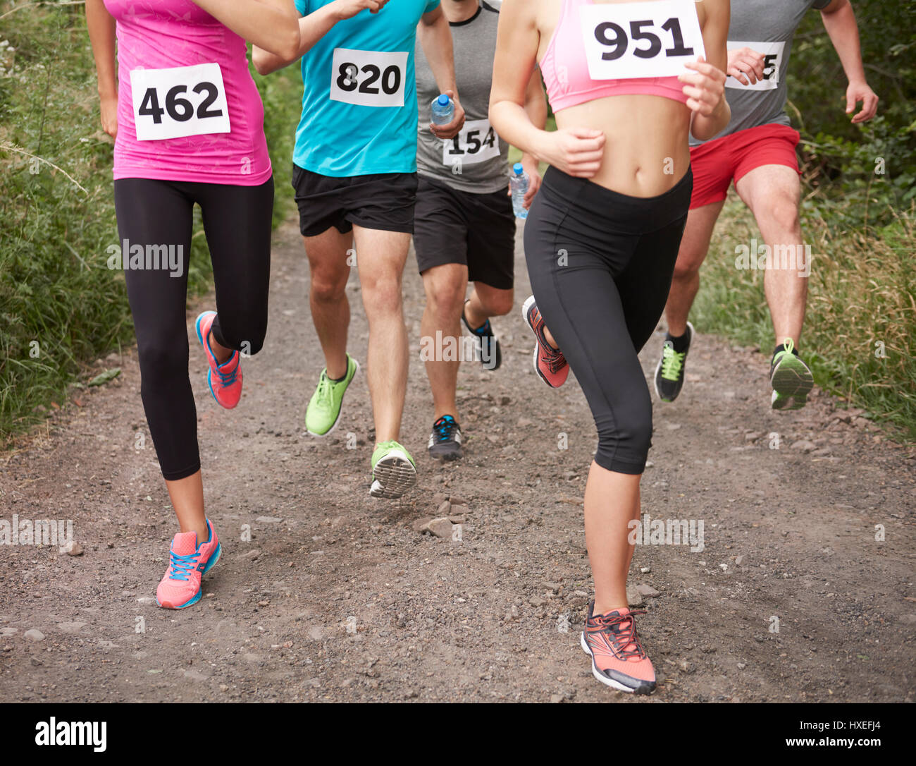 Human legs during the marathon Stock Photo - Alamy