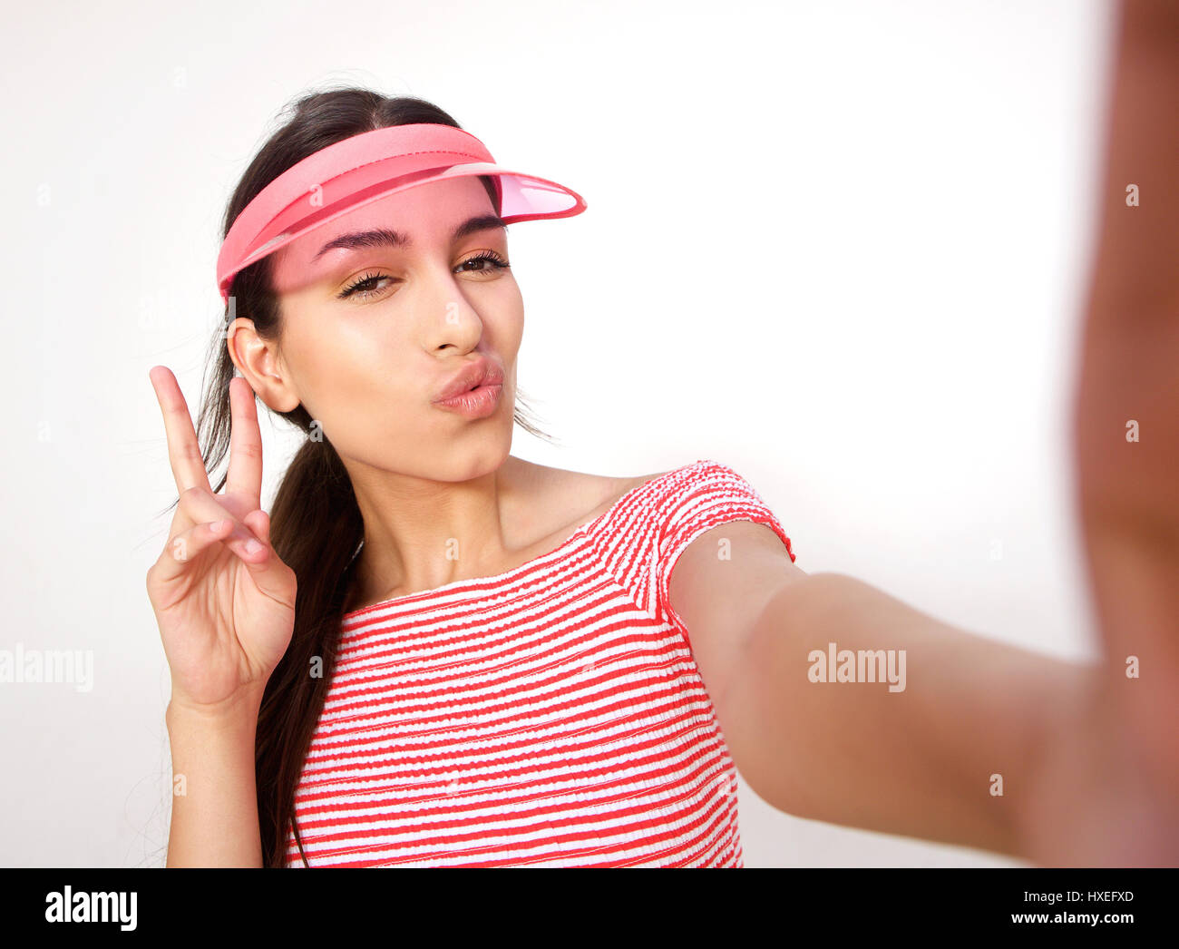 Close Up Portrait Of A Beautiful Girl Posing For Selfie With Peace Hand