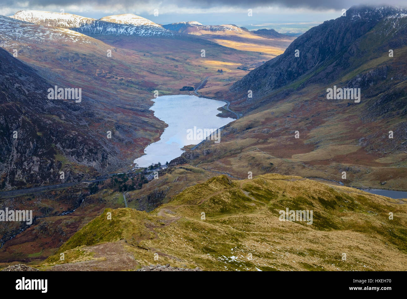 High view to Ogwen Valley and lake from Y Garn ridge path in Snowdonia ...