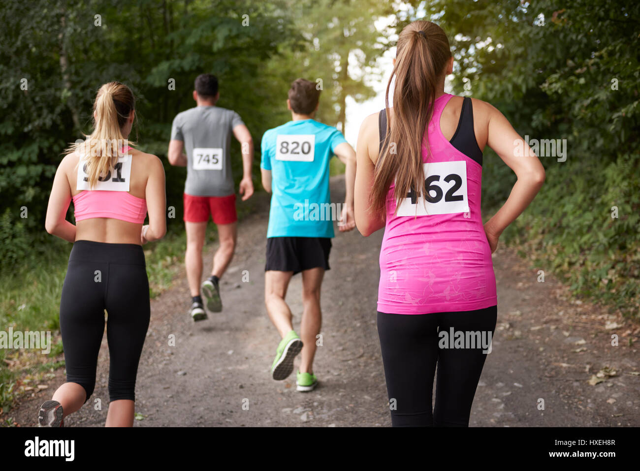 Rear view of marathon participants Stock Photo - Alamy