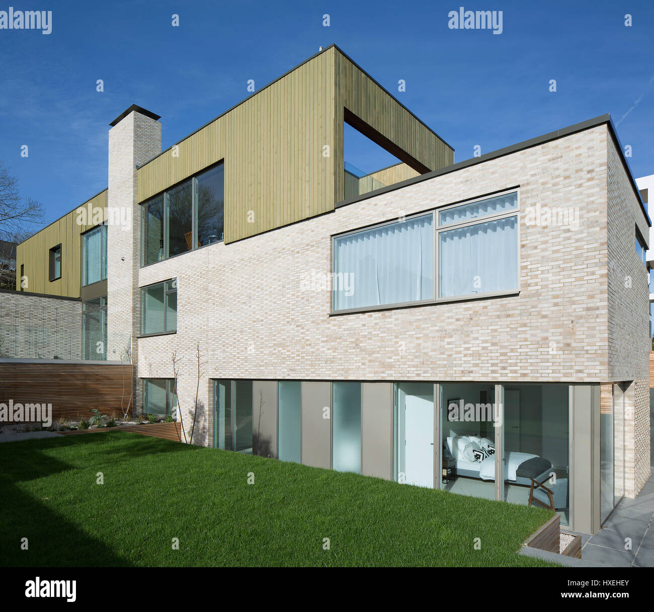 View of south facade and garden. Private Houses Withdean Road, Brighton ...