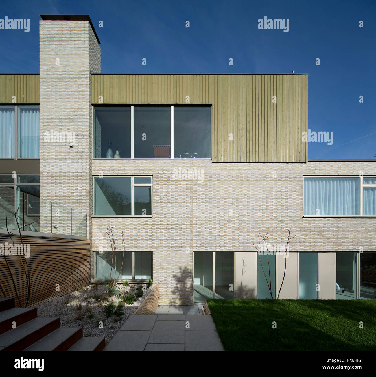 Detail view of end of south facade and garden. Private Houses Withdean ...