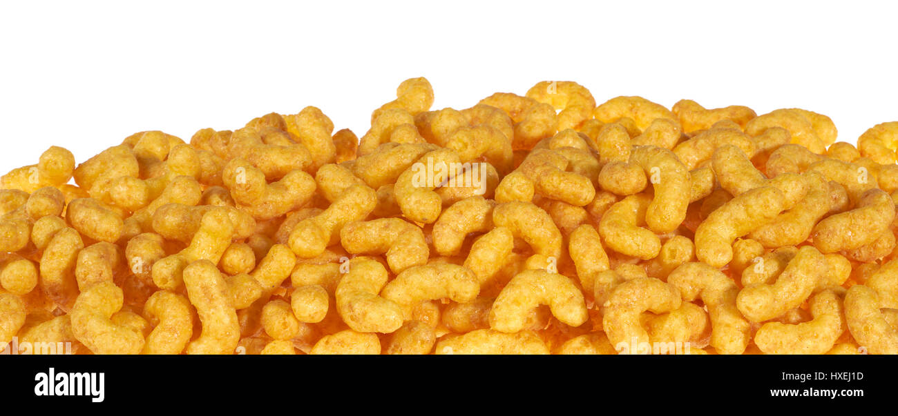 pile of Bamba in white back Stock Photo - Alamy