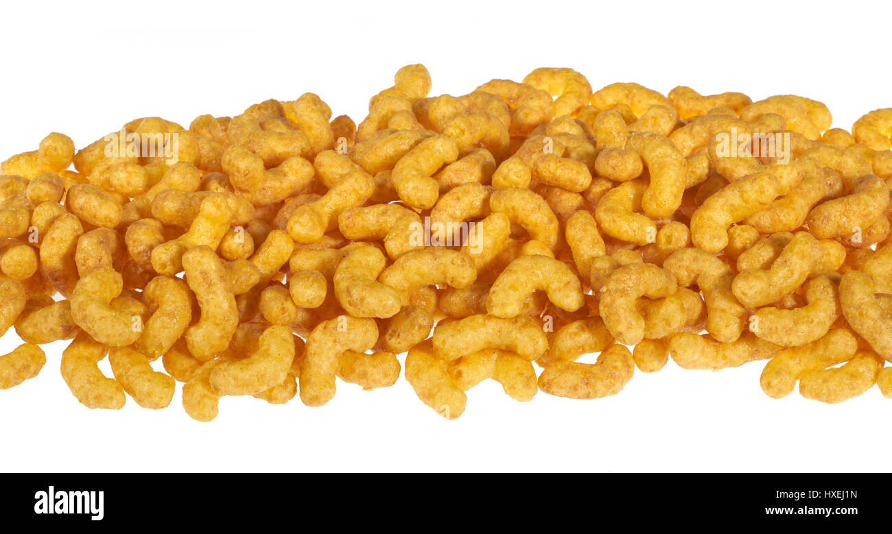 pile of Bamba in white back Stock Photo - Alamy