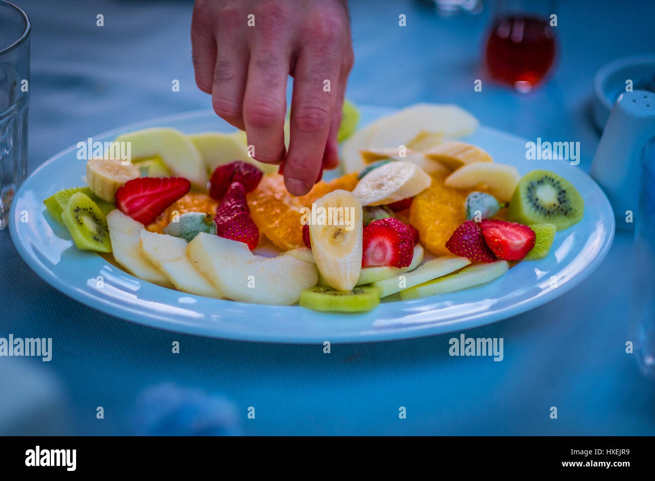 cut fruits hand Stock Photo - Alamy