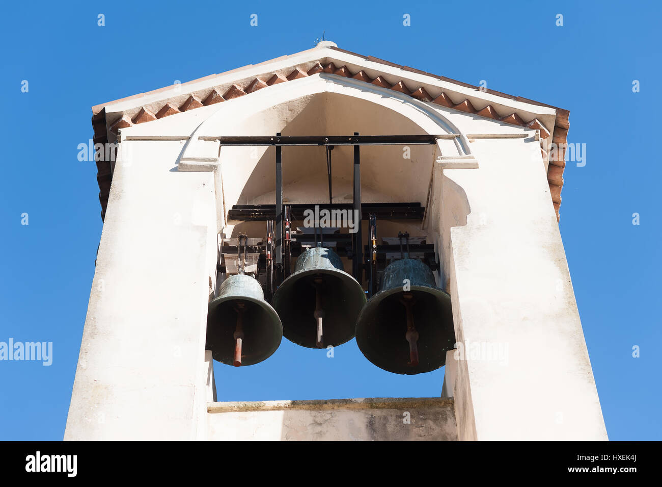 three bells on small belfry Stock Photo - Alamy