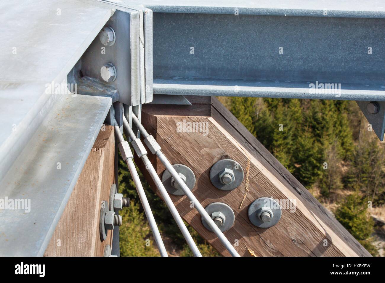 Wooden beams with screws in the structure. Assembling and connecting ...