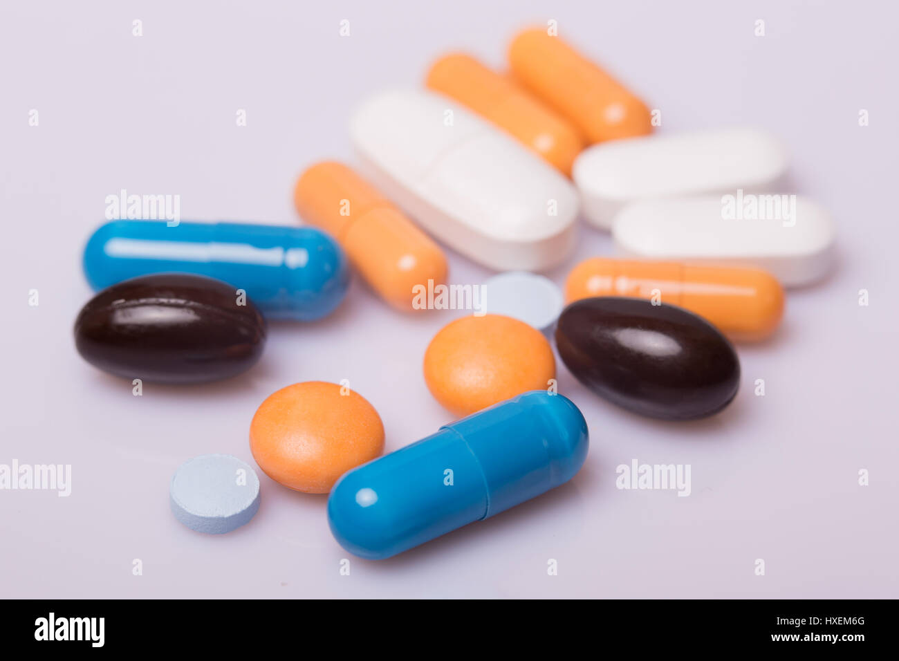different Tablets pills capsule heap mix therapy drugs Stock Photo - Alamy