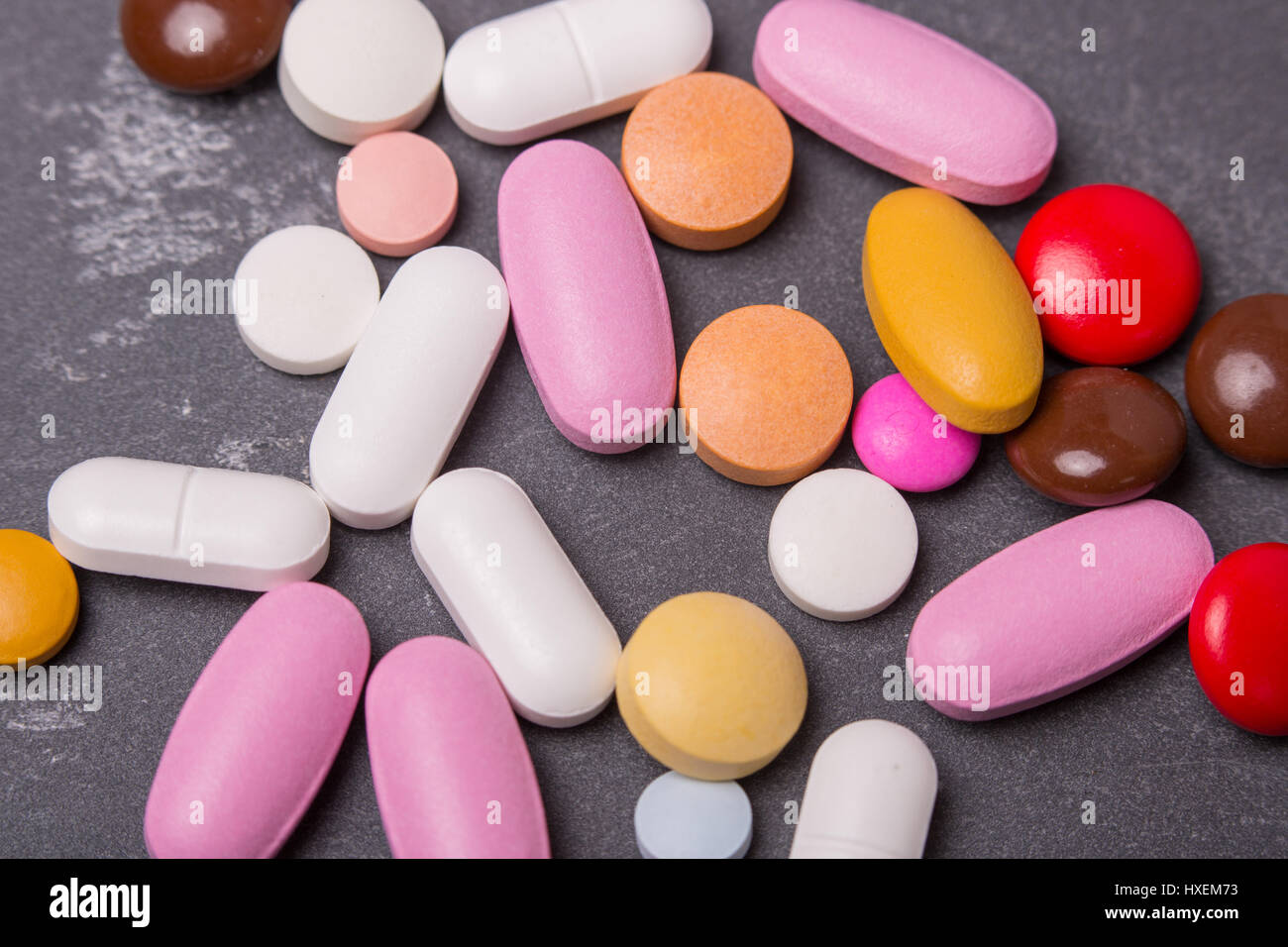 different tablets pills capsule heap mix therapy drugs Stock Photo - Alamy