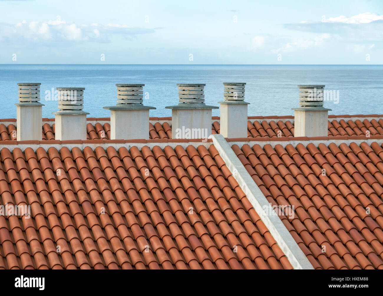 Chimney on a roof at the ocean Stock Photo - Alamy