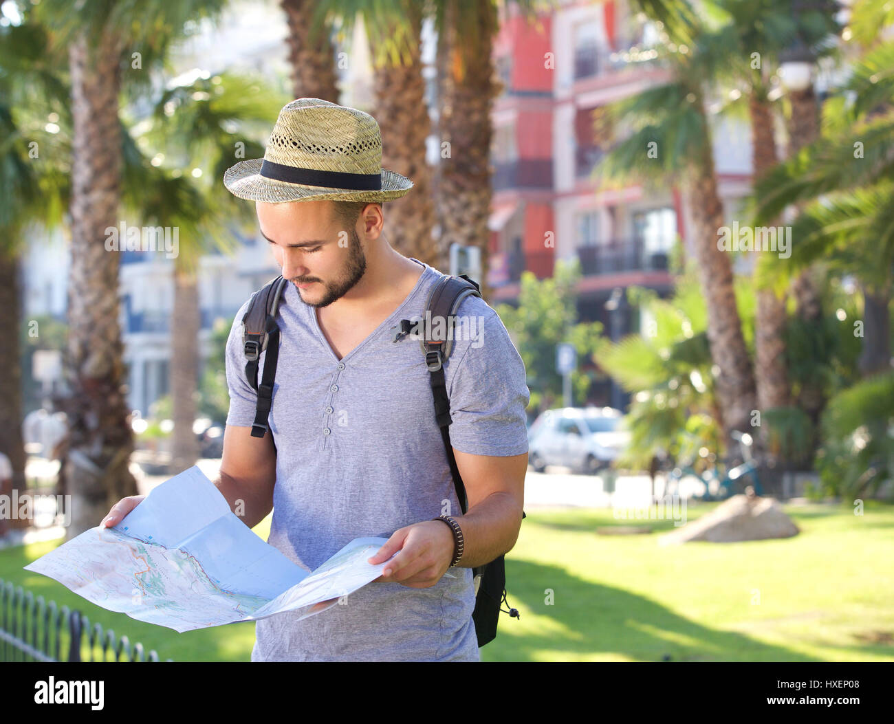 Standing man reading a map hi-res stock photography and images - Alamy