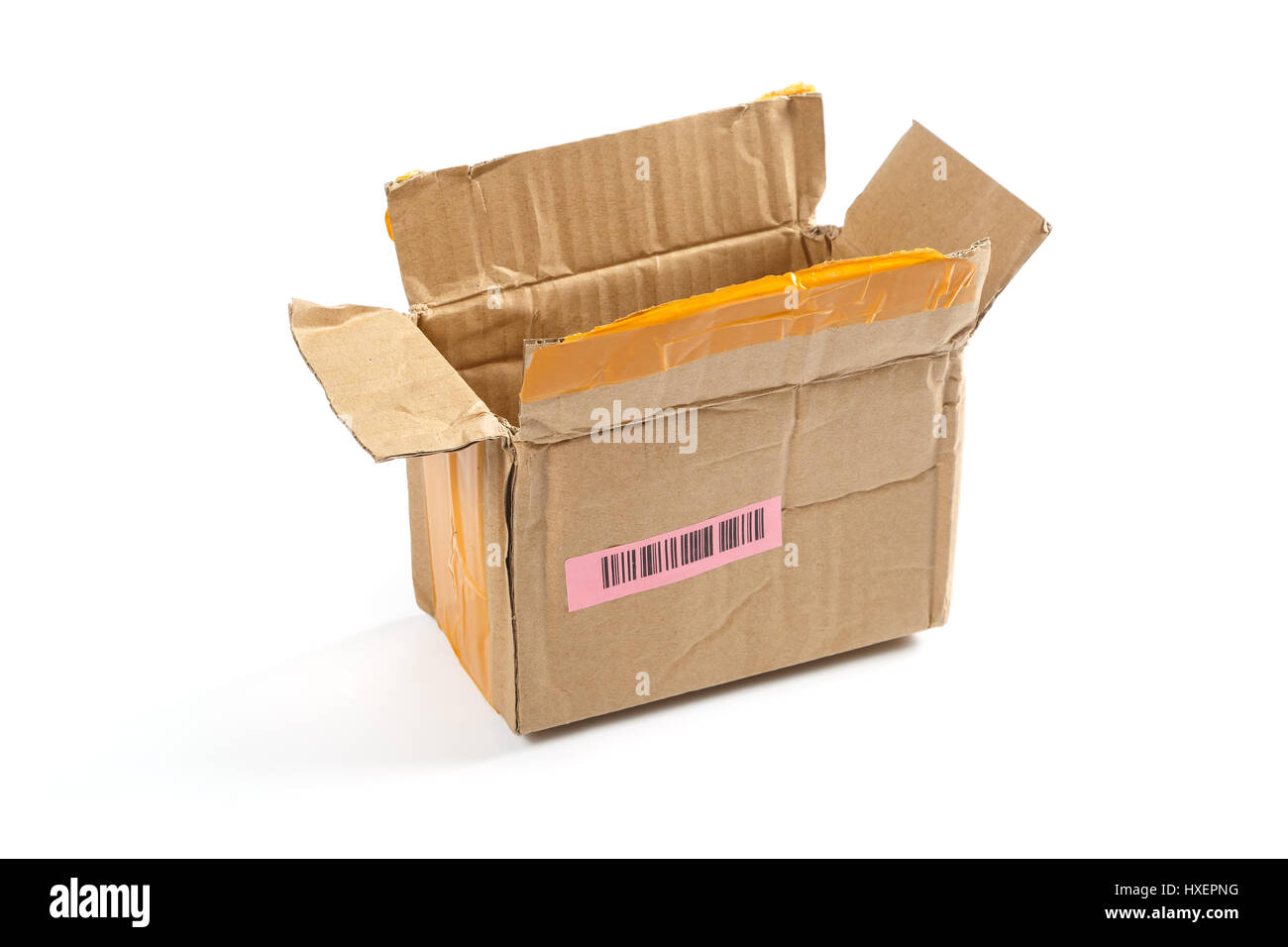 Open cardboard box with a label and barcode Stock Photo - Alamy