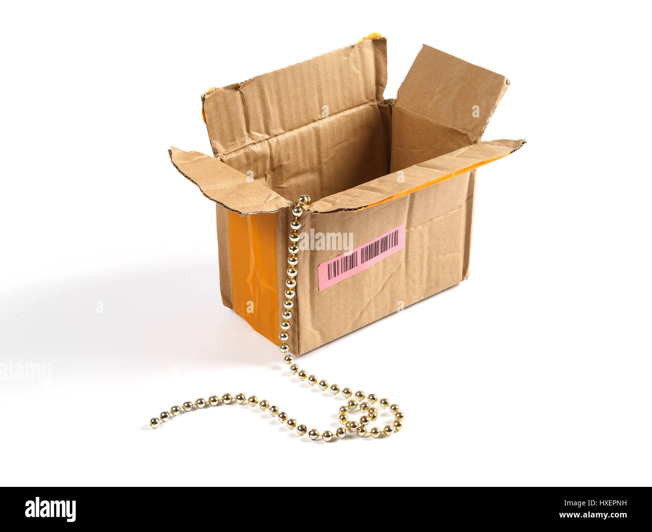 Open cardboard box and precious chain inside Stock Photo - Alamy