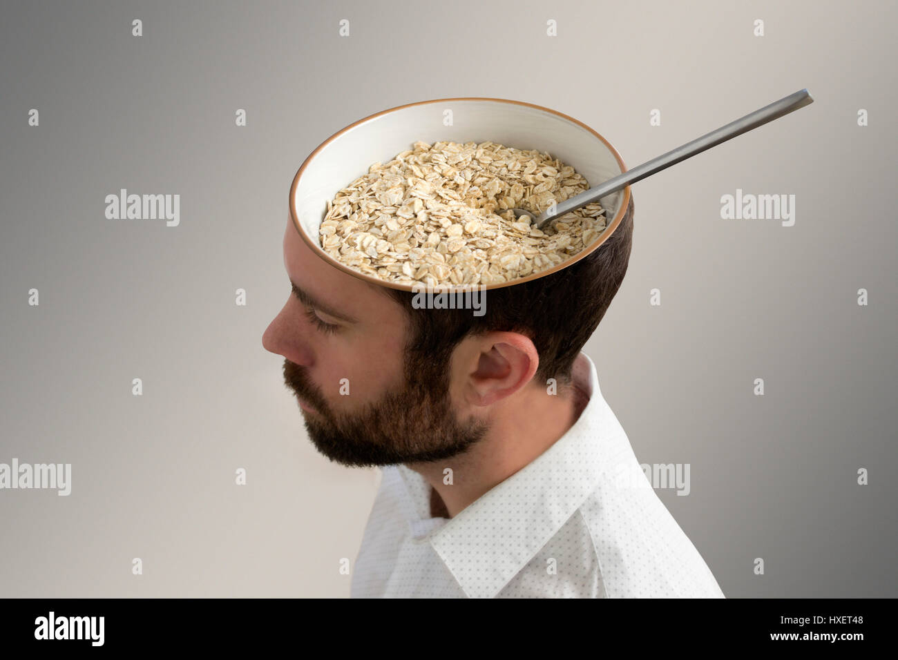 Oats and a spoon inside a man's head Stock Photo - Alamy