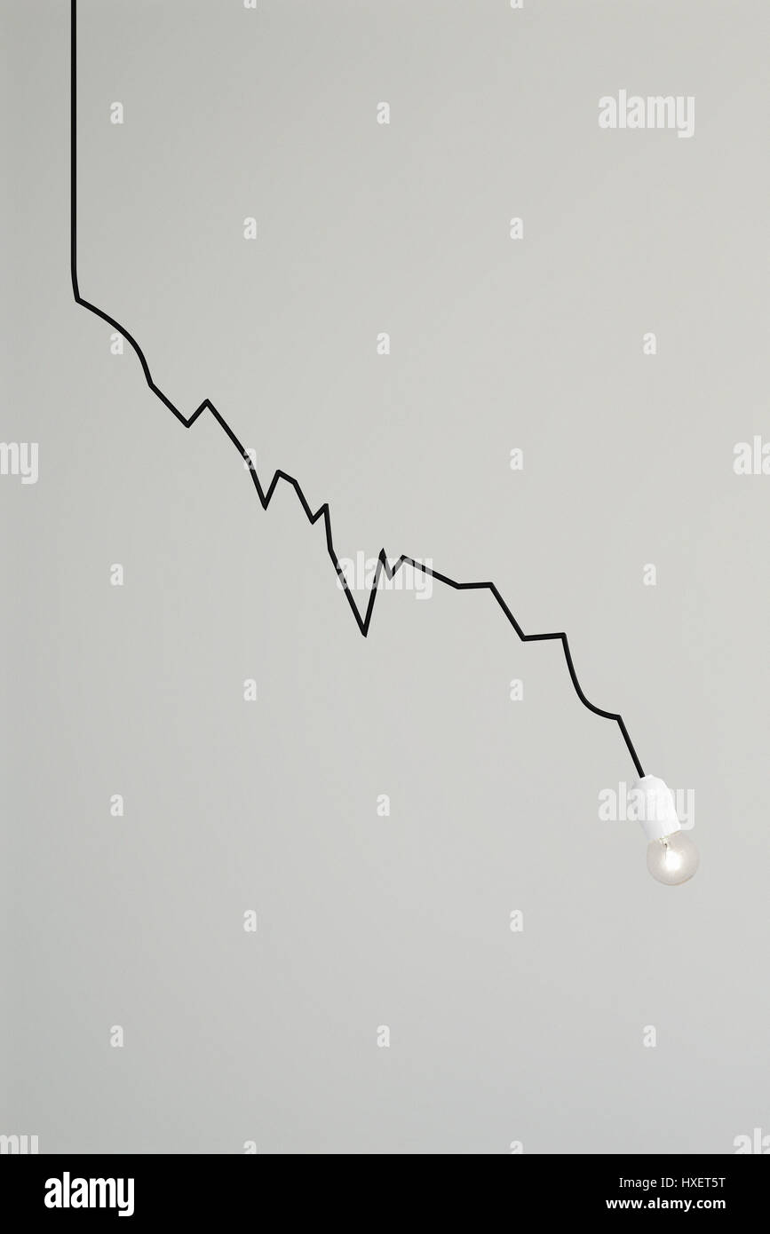 A lamps's electrical cable draws a falling chart Stock Photo - Alamy