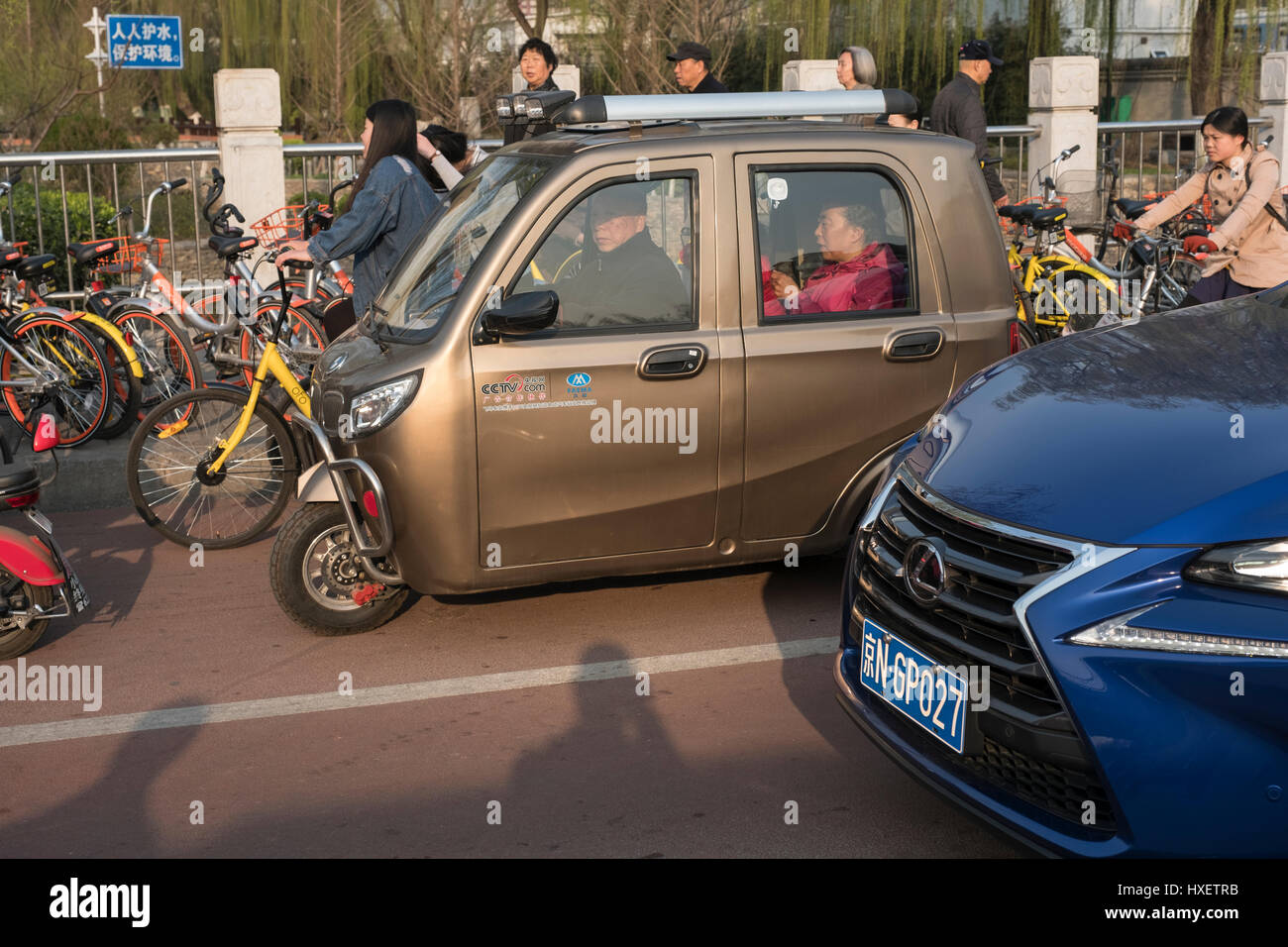 Unlicensed mini electric car in Beijing, China. 28-Mar-2017 Stock Photo ...