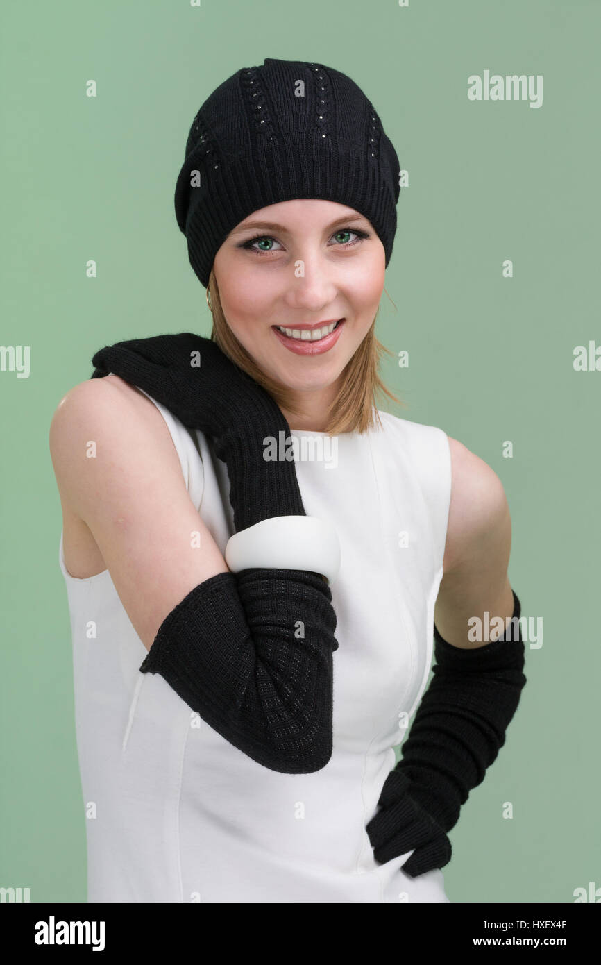 young woman wearing a winter cap Stock Photo - Alamy