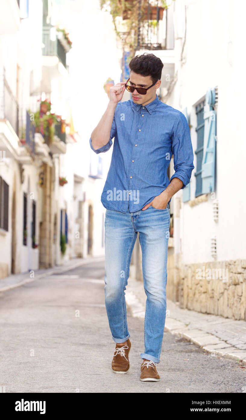 Man walking away street cool hi-res stock photography and images - Alamy