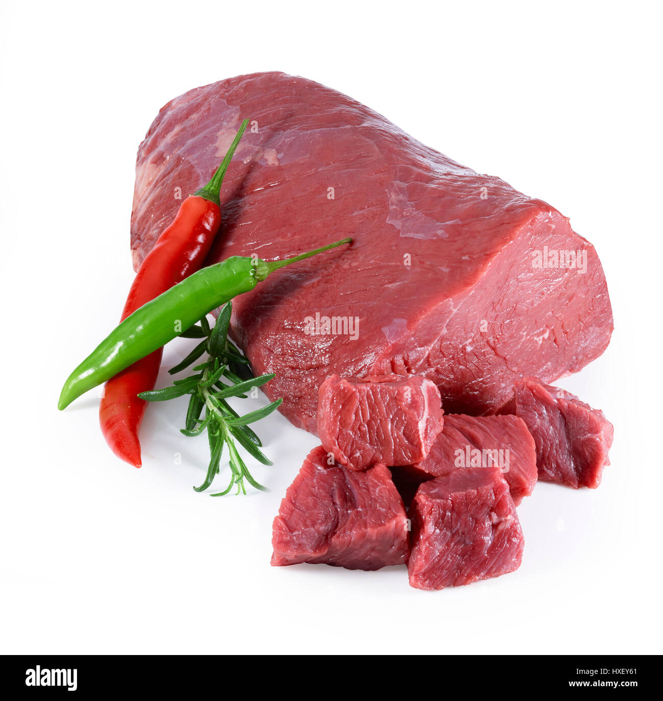 Raw beef, beef, pepperoni peppers (Capsicum) and rosemary (Rosmarinus ...