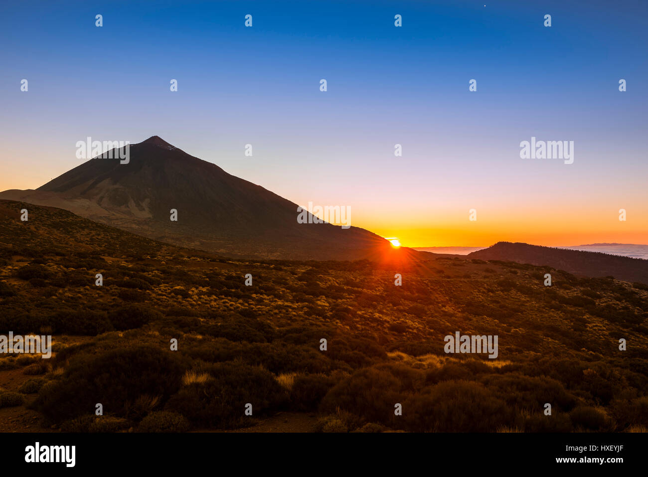 Sunset, sunset glow, cloudy sky, Volcano Teide and volcano landscape ...