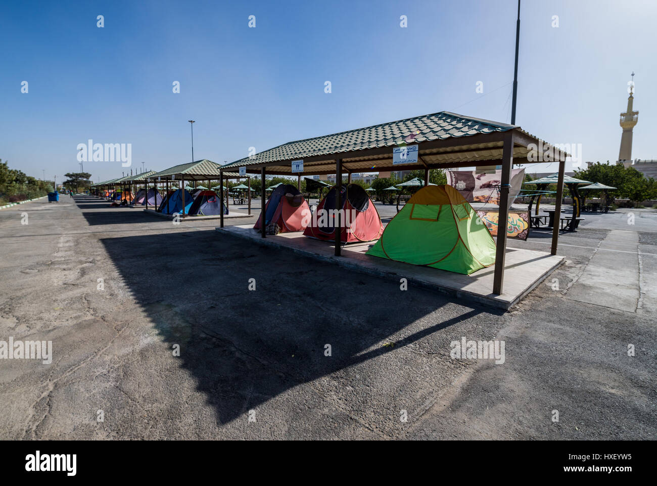 Pilgrims tents on a aprking lot in front of Mausoleum of Ayatollah ...