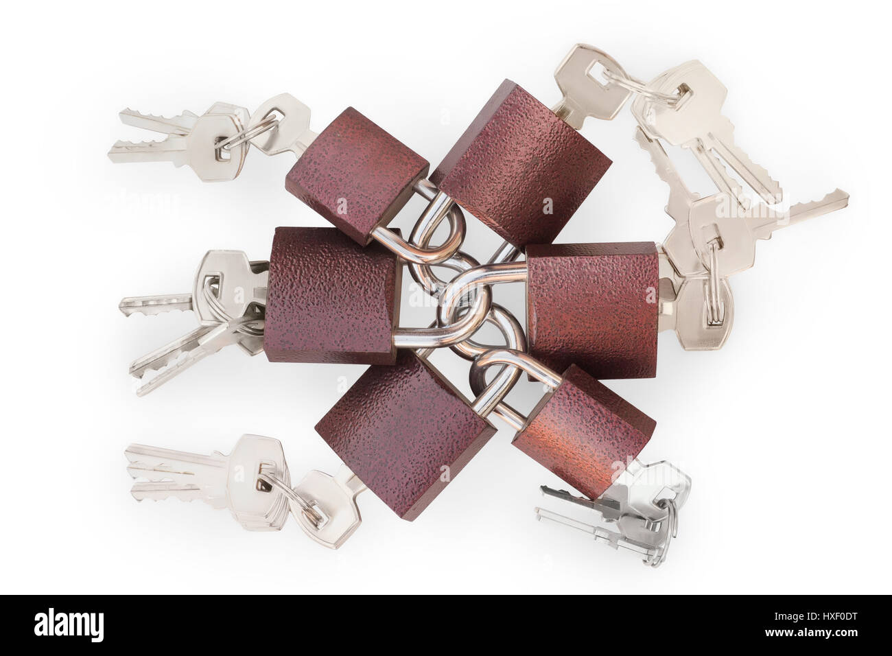 Small linked padlocks with keys. On white, clipping path included ...