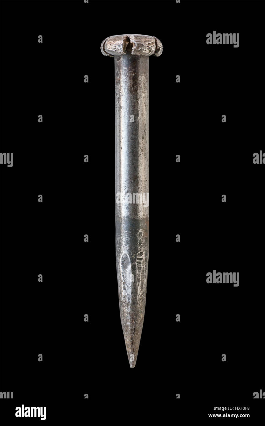 Old rough huge iron spike. Isolated on white, clipping path included ...