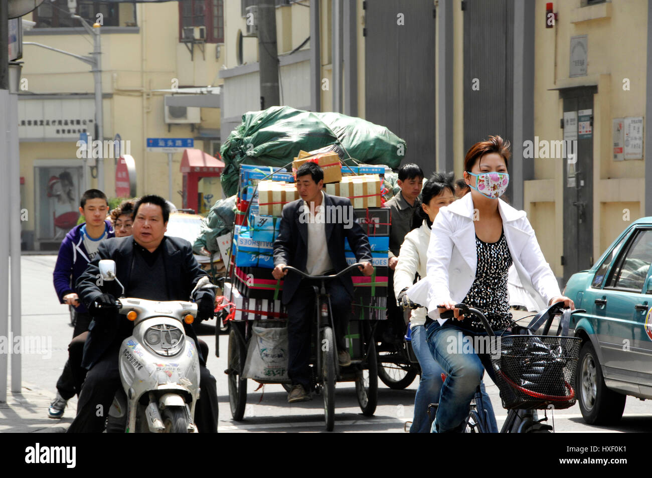 Shanghai people bikes hi-res stock photography and images - Alamy