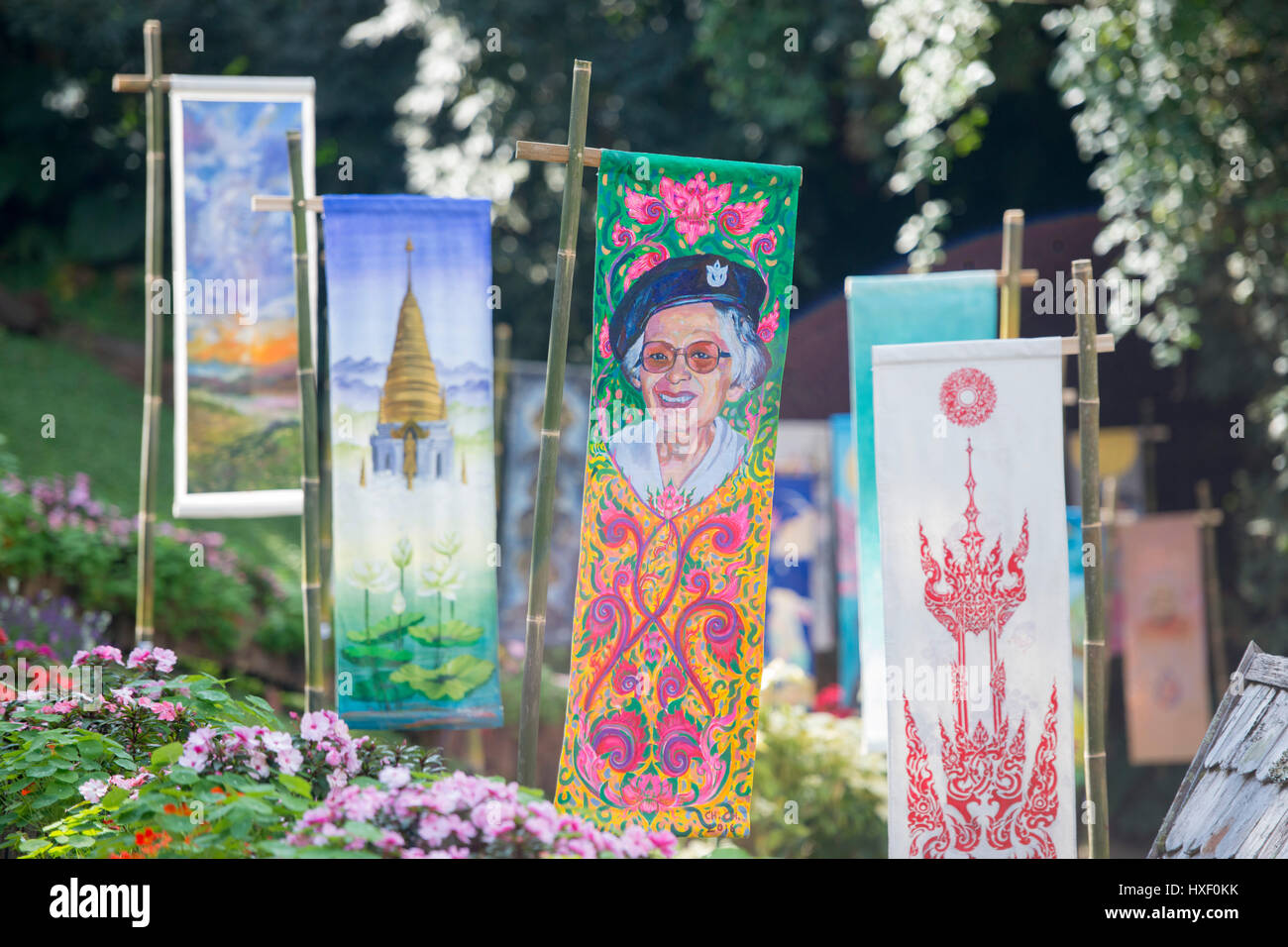 flags with pictures of the Tahi Royal Family at the Mae Fah Luang ...