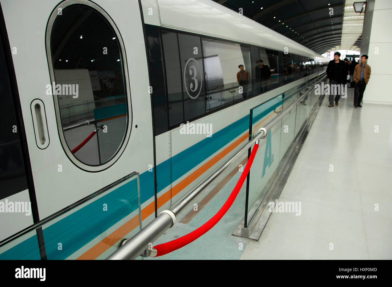 Passengers waiting to enter the Maglev Train in Shanghai. The Shanghai ...