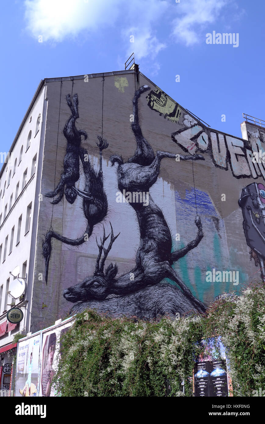 Street art by Belgian artist ROA in Berlin, Germany Stock Photo - Alamy