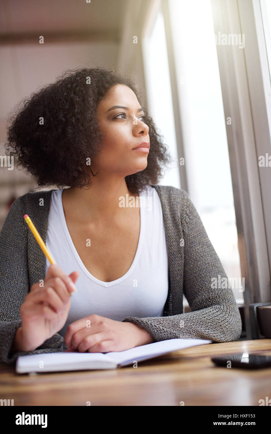 Close up portrait of a young african american woman thinking Stock ...
