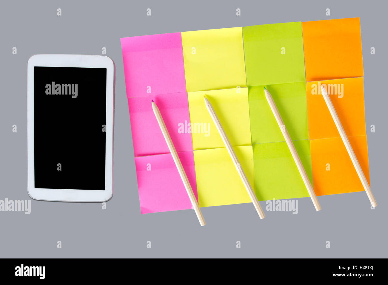 post it notes colorful blank next to mobile phone Stock Photo - Alamy