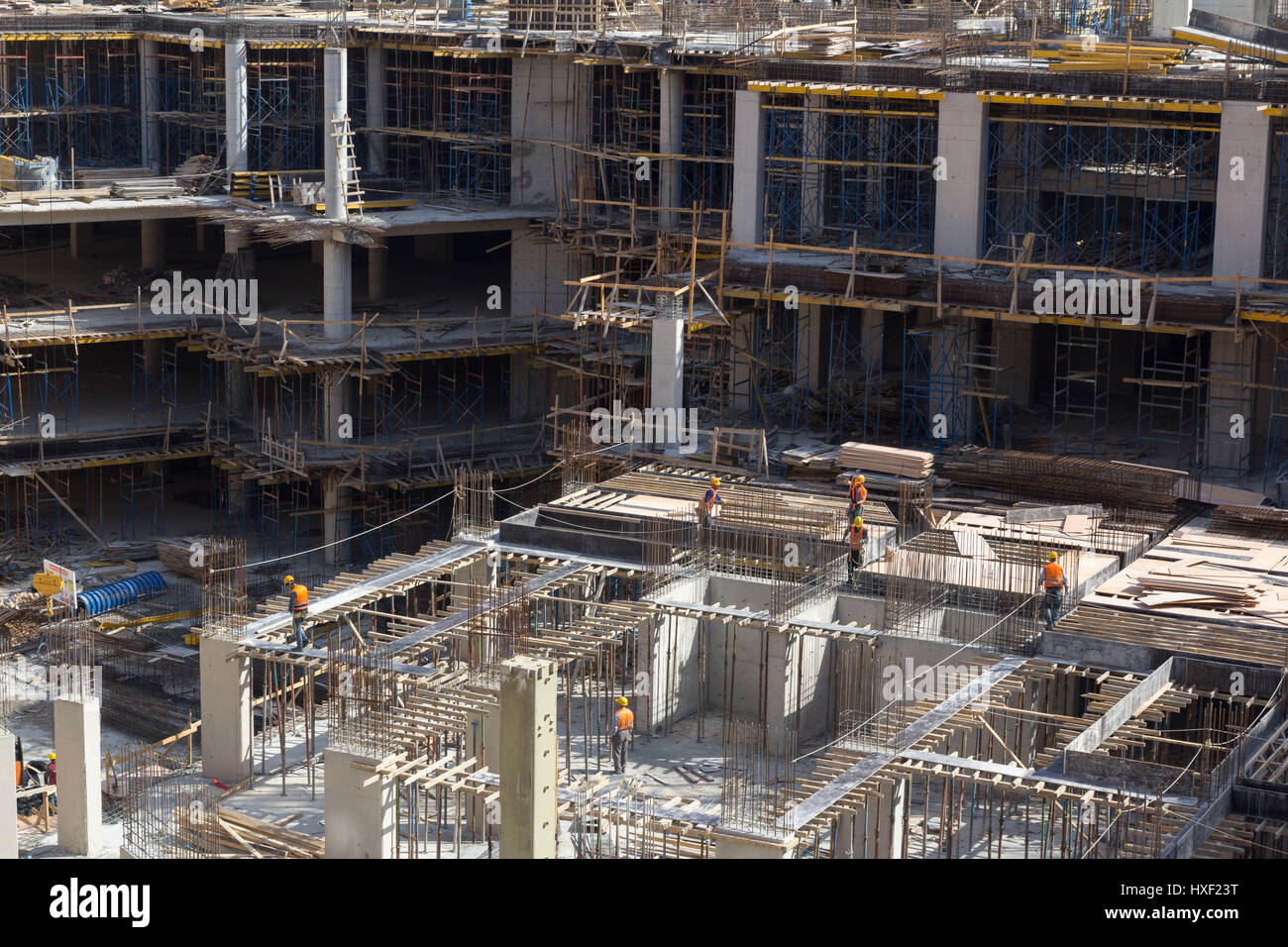 industrial workers working at contruction site building Stock Photo - Alamy
