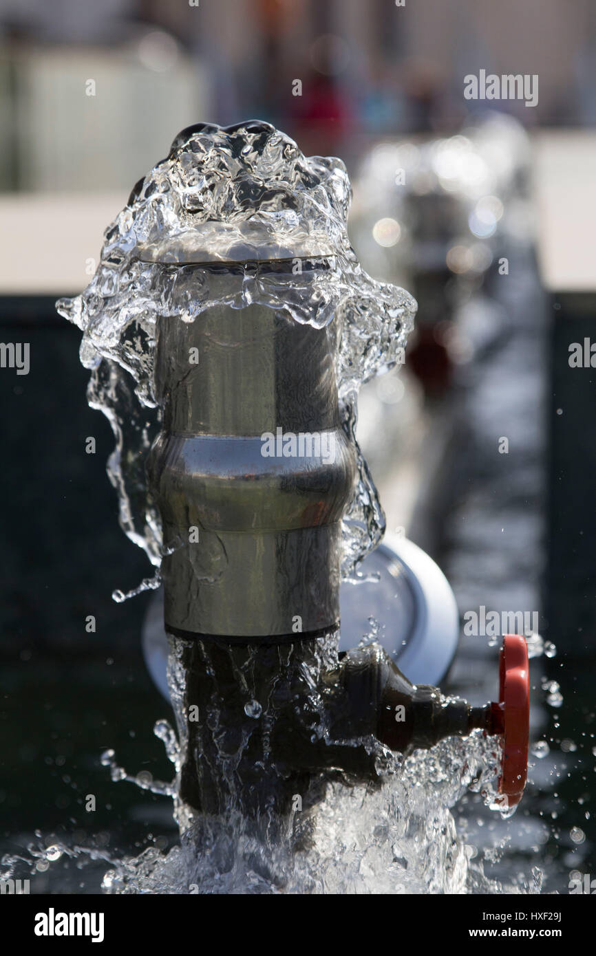 burst water pipe close up Stock Photo - Alamy
