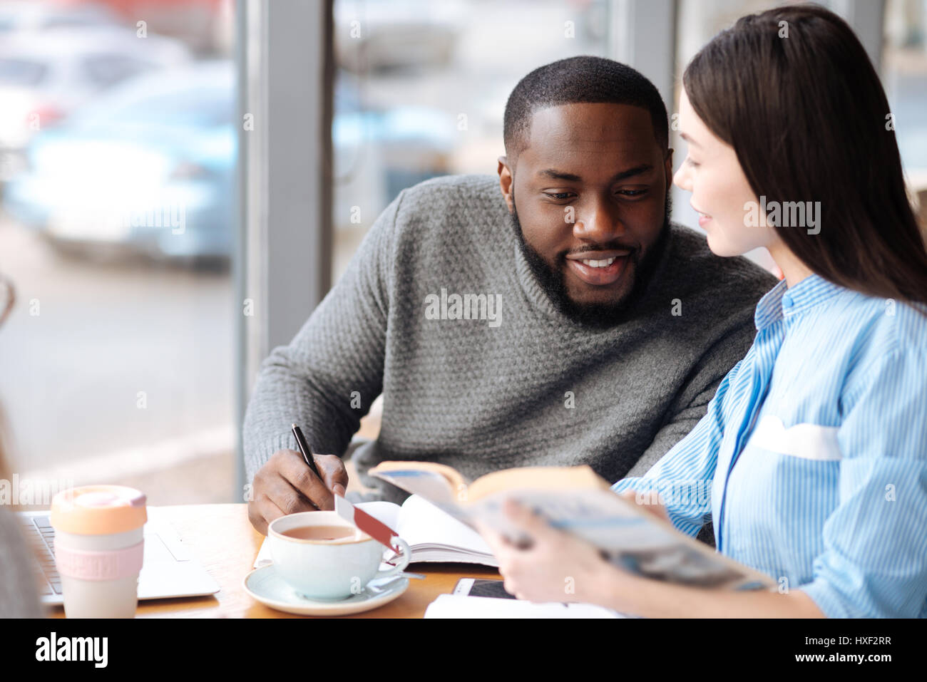 Smart positive student studying Stock Photo - Alamy