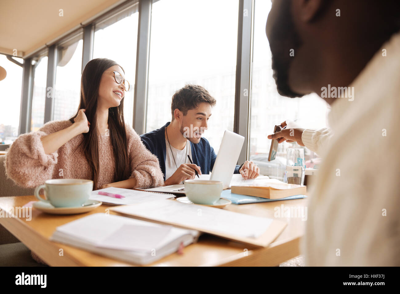 Smart international students learning together Stock Photo - Alamy