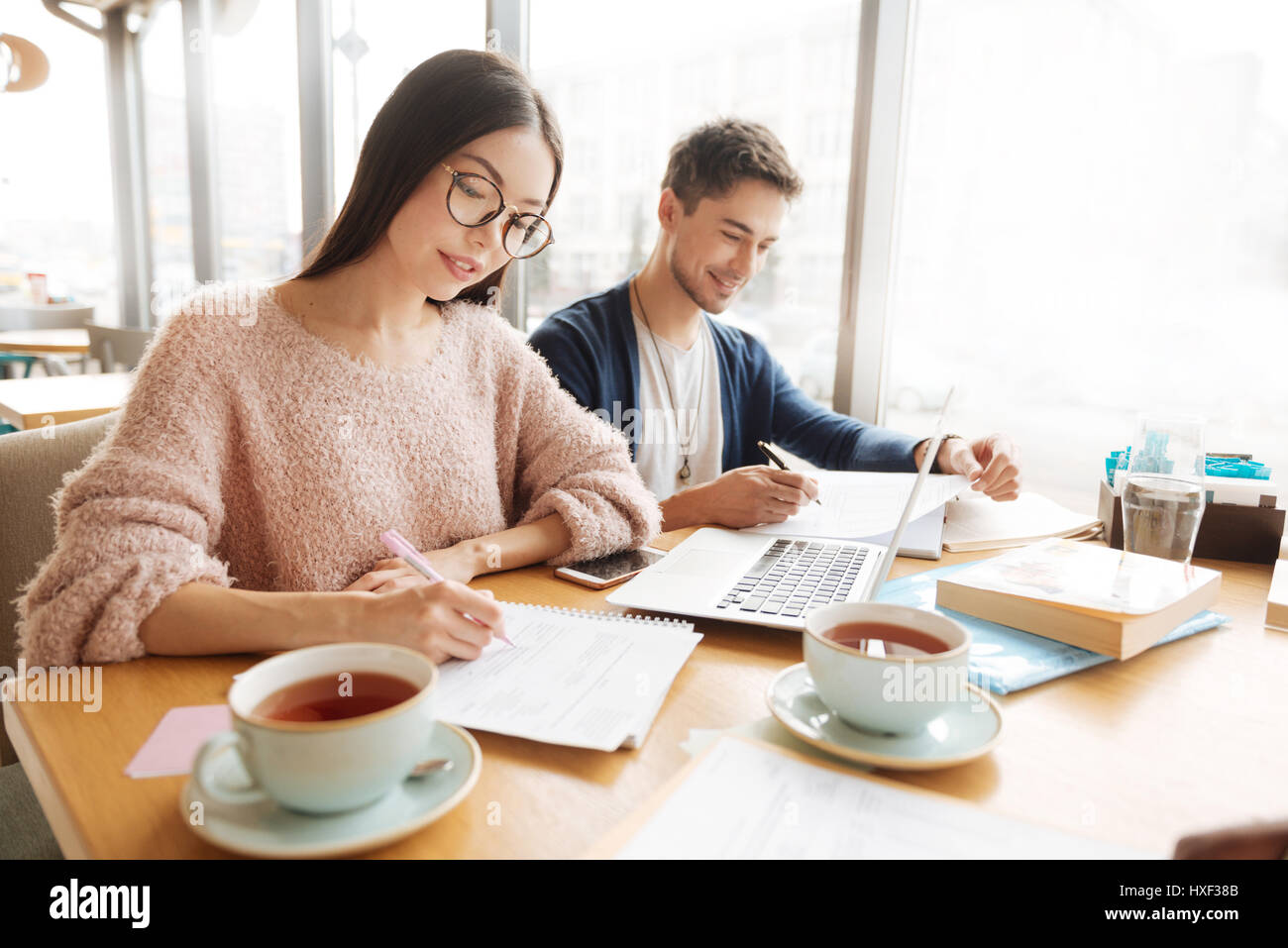 Smart students studying together Stock Photo - Alamy